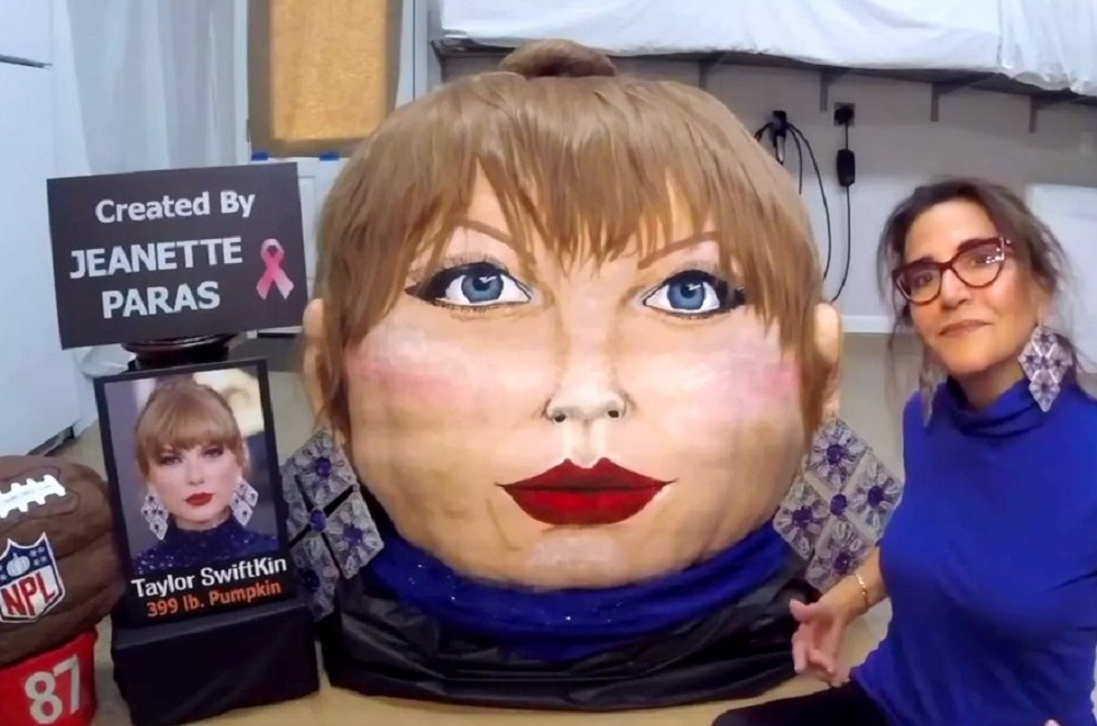 ၃၉၉ ပေါင် အလေးချိန်ရှိတဲ့ ရွှေဖရုံသီးပေါ်မှာ တေလာဆွစ်ဖ်ပုံရေးဆွဲခဲ့တဲ့ ...